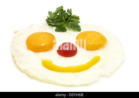 Smiley face Frühstück Sonnenseite Eier und eine Split-Wurst mit Tomaten ...