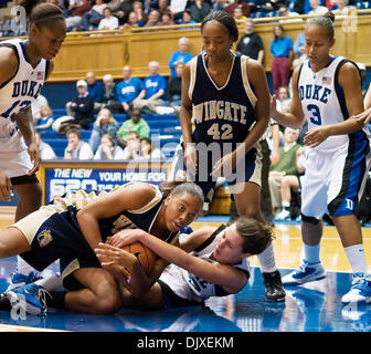 Duke forward Haley Peters (33) tries to shoot over Nebraska forward ...