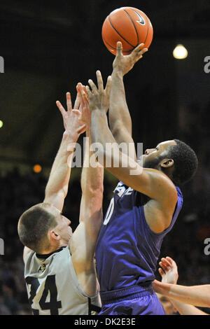 Kansas State guard Jacob Pullen, left, attempts to steal the ball from ...