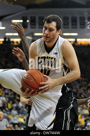 Iowa forward Zach McCabe (15) fights for a rebound with South Dakota ...