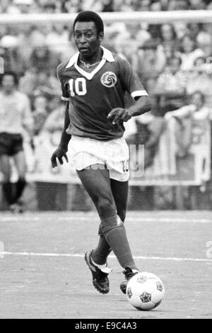 New York Cosmos' Pele (10) is seen heading for the ball despite ...