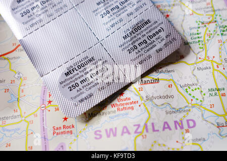 Ein Paket von Malaria Tabletten auf der Oberseite aus einer Karte des ...