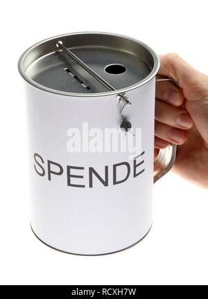 Spendenbox mit der Aufschrift Spende, Deutsch für Spende, mit Schlitzen ...