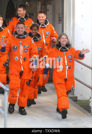 Space shuttle Discovery Commander Pamela Melroy, left, introduces her ...