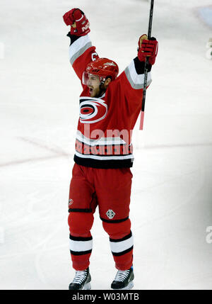 Carolina Hurricanes' Ray Whitney, center, celebrates his goal against ...