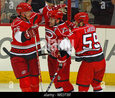 Carolina Hurricanes' Ray Whitney, center, celebrates his goal against ...