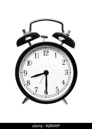 Wecker zeigt halb zwei auf weißem Hintergrund Stockfotografie - Alamy