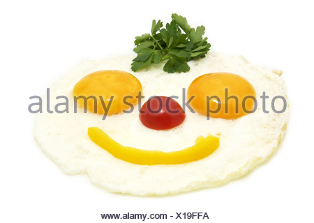 Smiley face Frühstück Sonnenseite Eier und eine Split-Wurst mit Tomaten ...