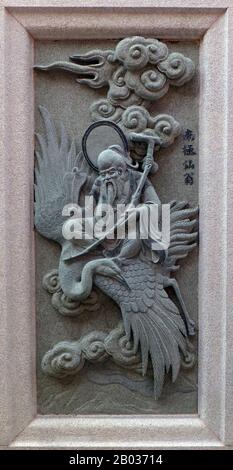 Chine : sculpture du sage légendaire Jiang Ziya, représentant son rôle ...