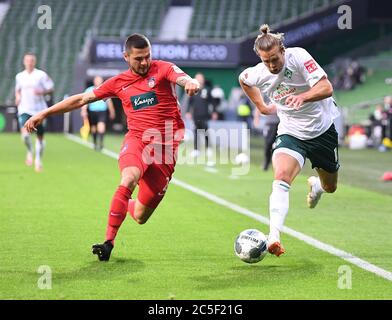 Marnon Busch (FC Heidenheim, #02) kommt nicht in den Zweikampf. Max ...