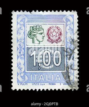 Un timbre-poste imprimé en malgache Republica montre un chien pinscher ...