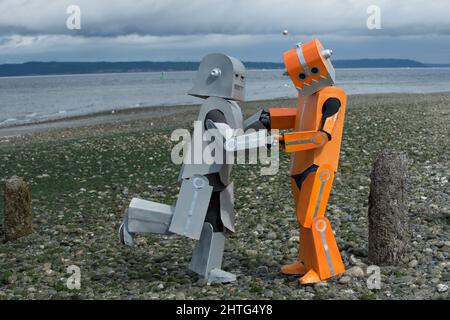Des robots colorés dansent, s'amusent sur la plage. Amis robots, robots ...