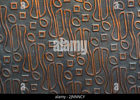 Batik indonésien traditionnel texturé sur l'acier. Paroi en acier ...