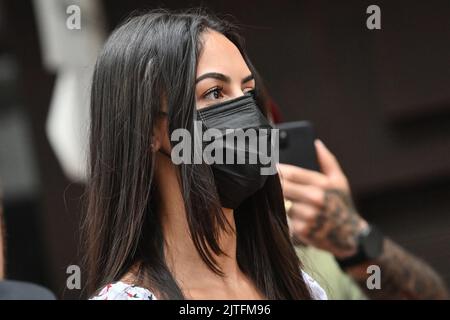 Oumaima Oumi Rayane, partenaire d'Evenepoel, photographié après la ...