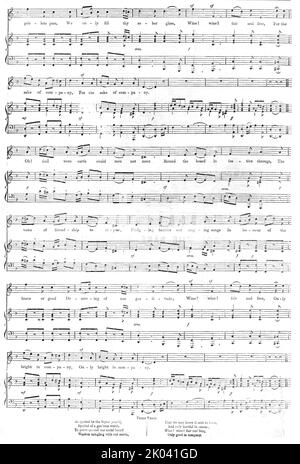 Feuille de musique avec la chanson de Noël 'Oh Tannenbaumm', décorée ...