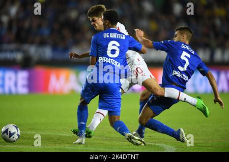Charles de Ketelaere (Milan)Koni de Winter (Empoli)Alberto Grassi (Empoli) pendant le match ...