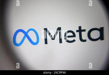 Le logo de Meta Platforms Inc. Est représenté par une loupe dans cette photo d'illustration ...