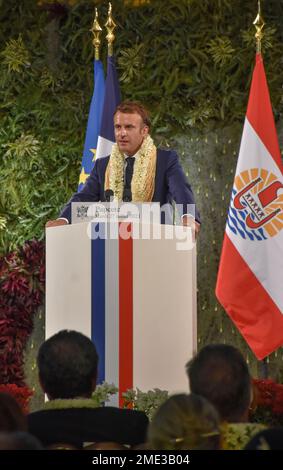 France's President Emmanuel Macron wearing a flower lei and seashell ...