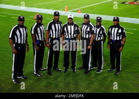 NFL officials, from left, umpire Barry Anderson, side judge Anthony ...