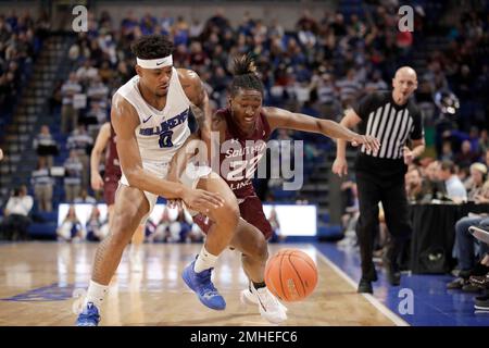 Southern Illinois' Harwin Francois, right, and Saint Louis' Jordan ...
