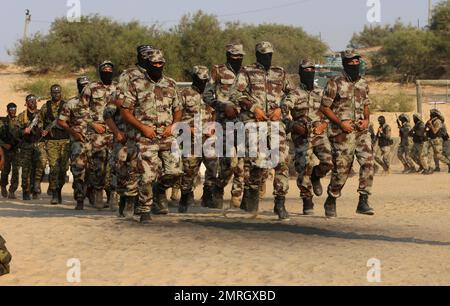 Masked militants from the al-Nasser Brigades, an armed wing of the ...