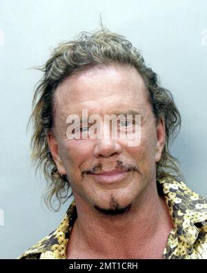 Le méchant acteur Mickey Rourke, vu ici sur sa photo de réservation, a ...