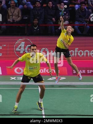 British badminton players Gabrielle Adcock, top right, hugs teammate ...
