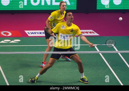 British badminton players Gabrielle Adcock, top right, hugs teammate ...