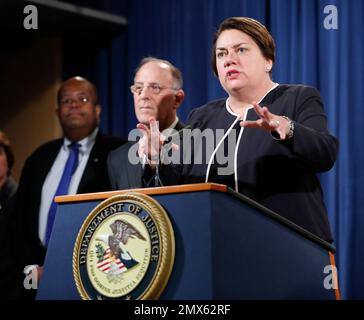 Assistant Attorney General Leslie R. Caldwell, center, of the Criminal ...