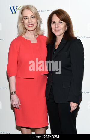 Business Wire President and CEO Cathy Baron Tamraz, left, and Berkshire ...