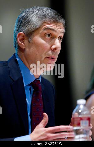 Blue Shield of California CEO Paul Markovich, left, speaks during a ...