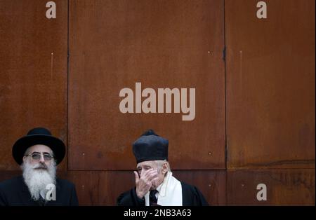 Rabbi Rafael Schaffer, left, stands next to Cantor Iosif Adler, right ...
