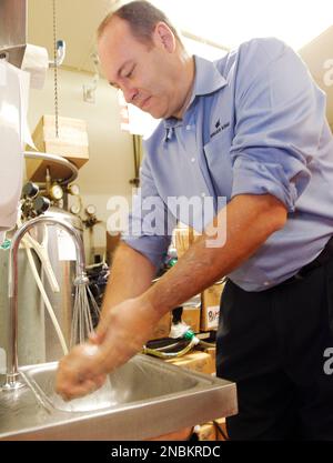 President of Miami-based Burger King, Steve Wiborg, in apron, with ...