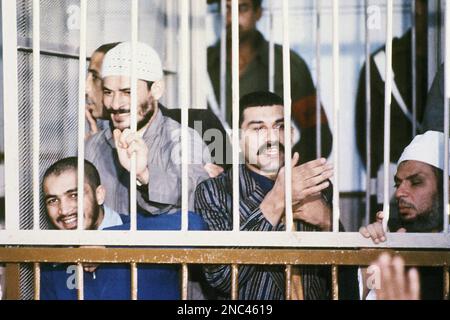 The trial of 24 members of a Muslim extremist group was resumed in ...