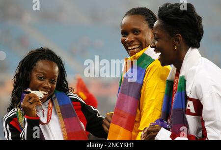 Canada's Tabia Charles, left, Trinidad's Ayanna Alexander, center, and ...