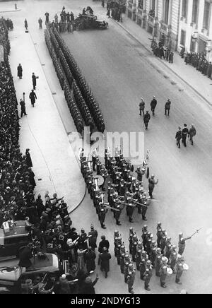 German Chancellor Adolf Hitler reviewing members of the Free Corps in ...