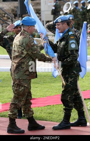 UNIFIL commander Maj. Gen. Claudio Graziano, right, salutes during a ...