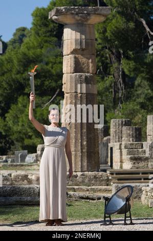 Greek actress Maria Nafpliotou, playing the role of a high priestess ...