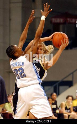 North Carolina's La'Tangela Atkinson (22), Ivory Latta (12) and Nikita ...