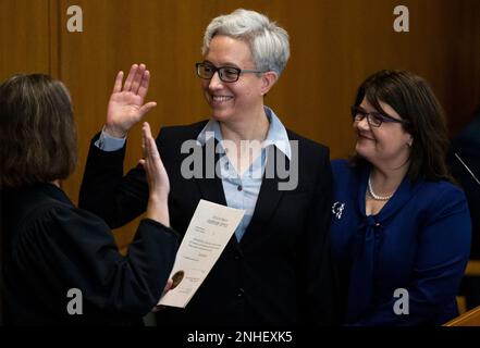 Tina Kotek, center, is accompanied by her wife Aimee Wilson, right, as ...