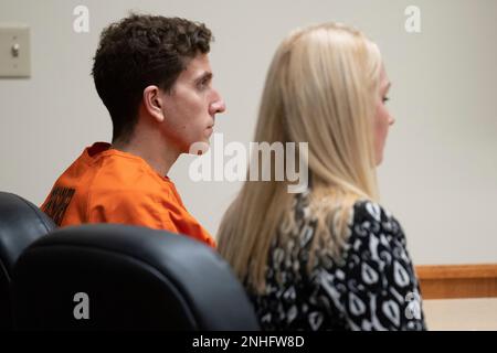 Public defender Anne Taylor, left, speaks with attorney Jay Logsdon ...