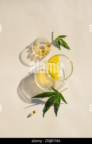 Verrerie de laboratoire et flacon de pipette avec sérum et huile sur ...