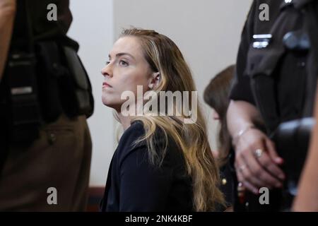 Whitney Henriquez, sister of actor Amber Heard, watches a previously ...