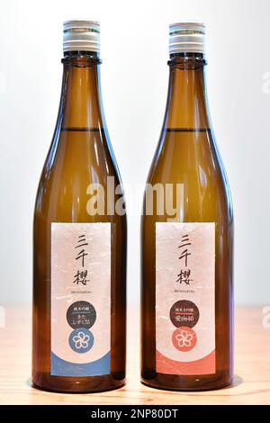 A photo shows bottles of sake (Japanese rice wine) in Higashikawa Town ...