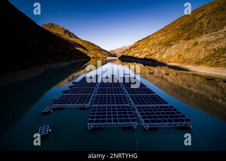 Floating barges with solar panels are pictured on the 'Lac des Toules ...