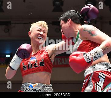 Japan's Naoko Fujioka (L) lands a punch against Mexico's Isabel Millan ...