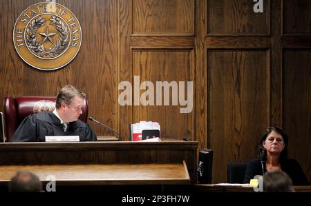 Jodi Routh, right, mother of former Marine Cpl. Eddie Ray Routh, pauses ...