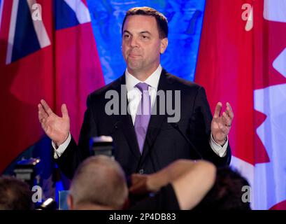 Ontario Progressive Conservative leader Tim Hudak, right, announces ...