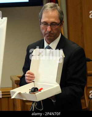 Mason County Prosecutor Paul Spaniola makes his opening statement ...
