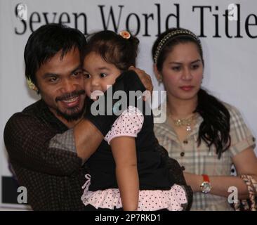 Filipino boxing great Manny Pacquiao and his mother Dionesia hold his ...
